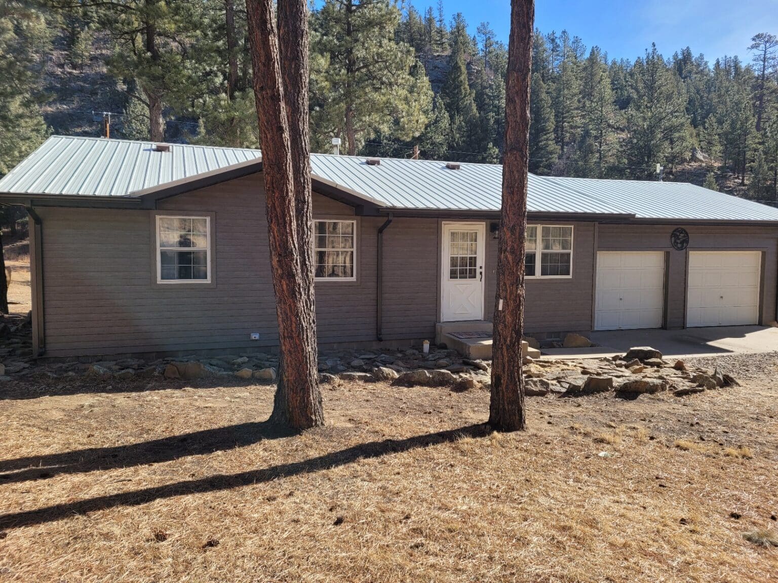 Weathered Gray Steel Lap Siding Home in Weston CO